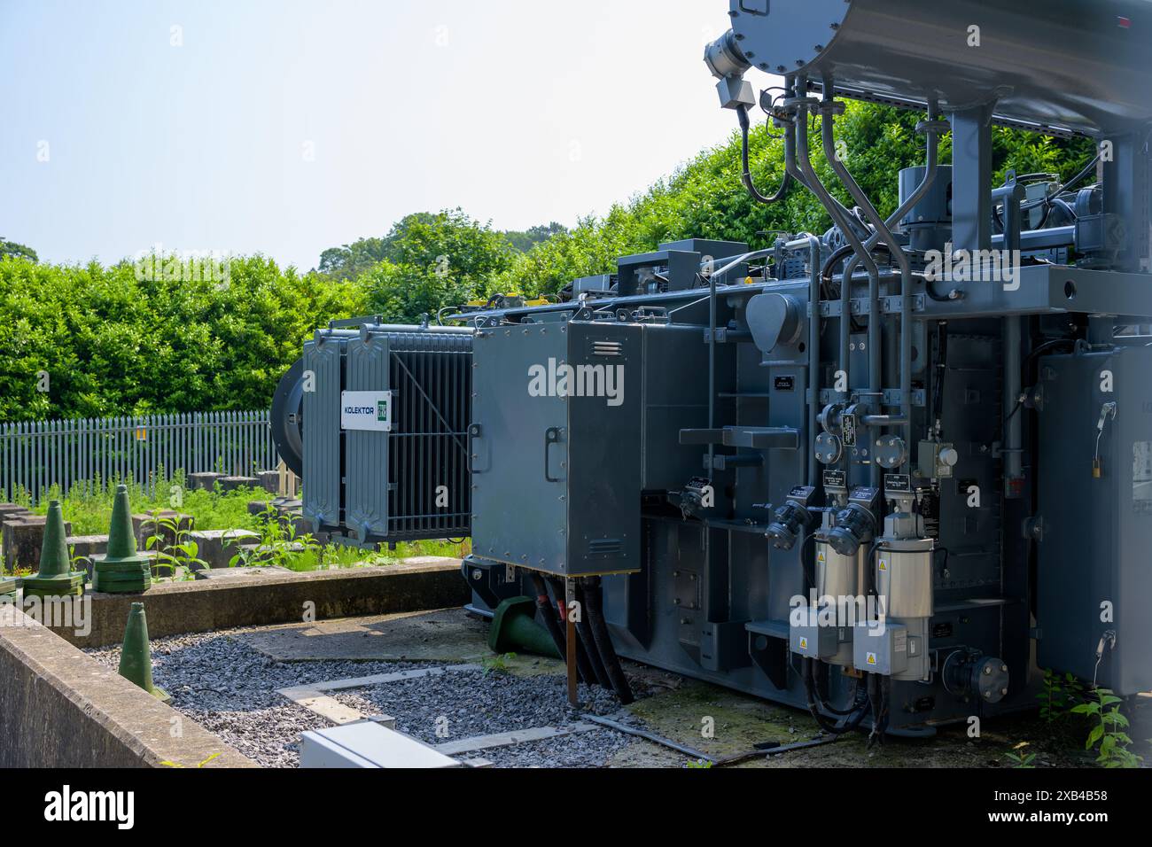 Conwy Wales Uk 06-01-2024. Power transformer amid green foliage at ...