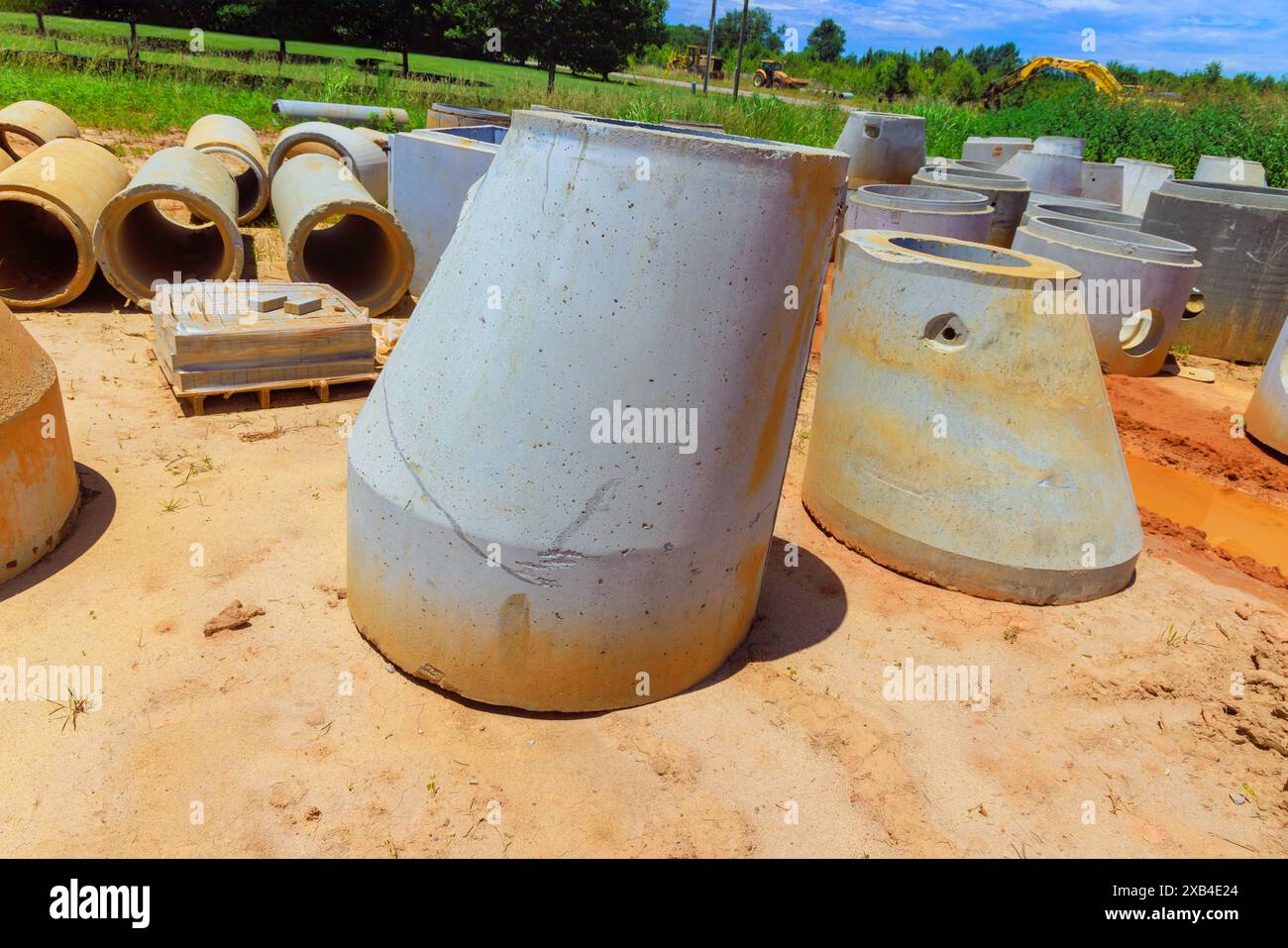 Stack of concrete drainage wells for water discharges in construction ...