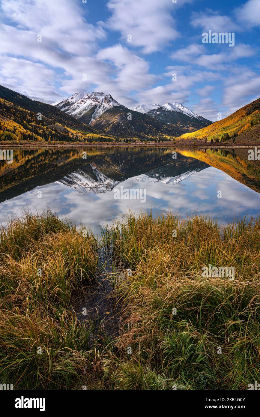 Snow capped mountains reflected in Crystal Lake outside Ouray, Colorado ...