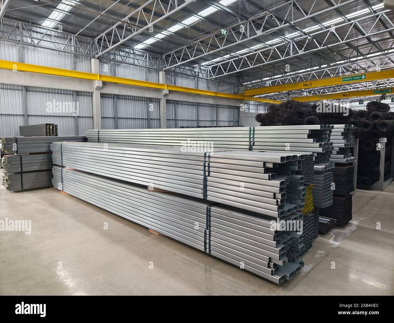 A big warehouse packed with numerous metallic nets and profile Stock ...