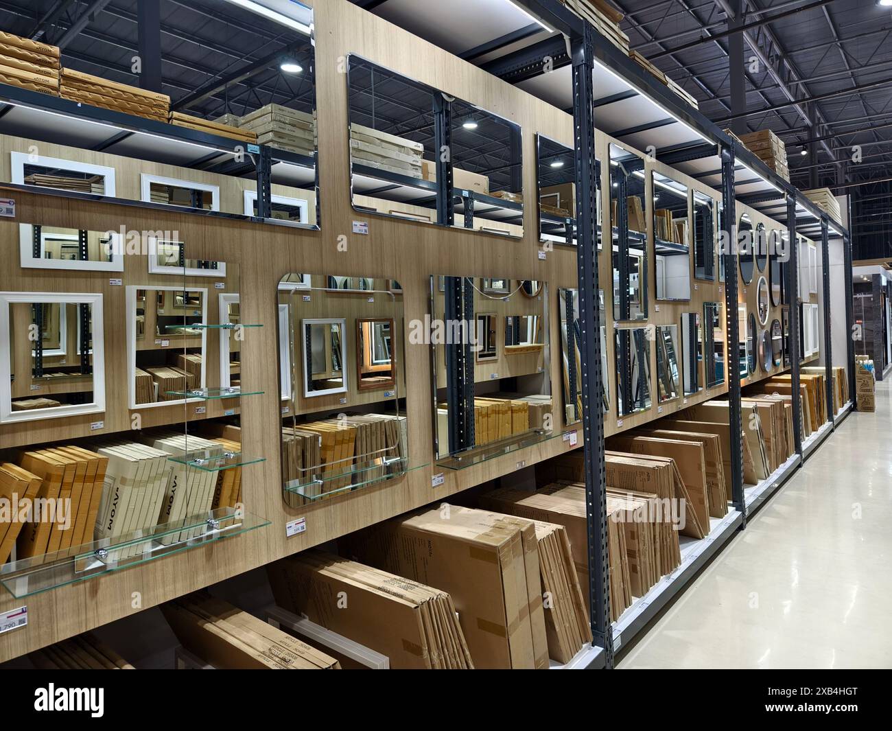 A warehouse packed with numerous mirrors and boxes Stock Photo - Alamy