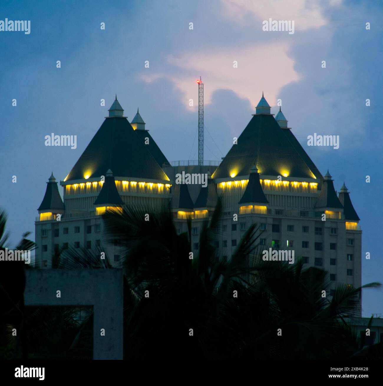 his striking photograph captures a grand, castle-like building ...