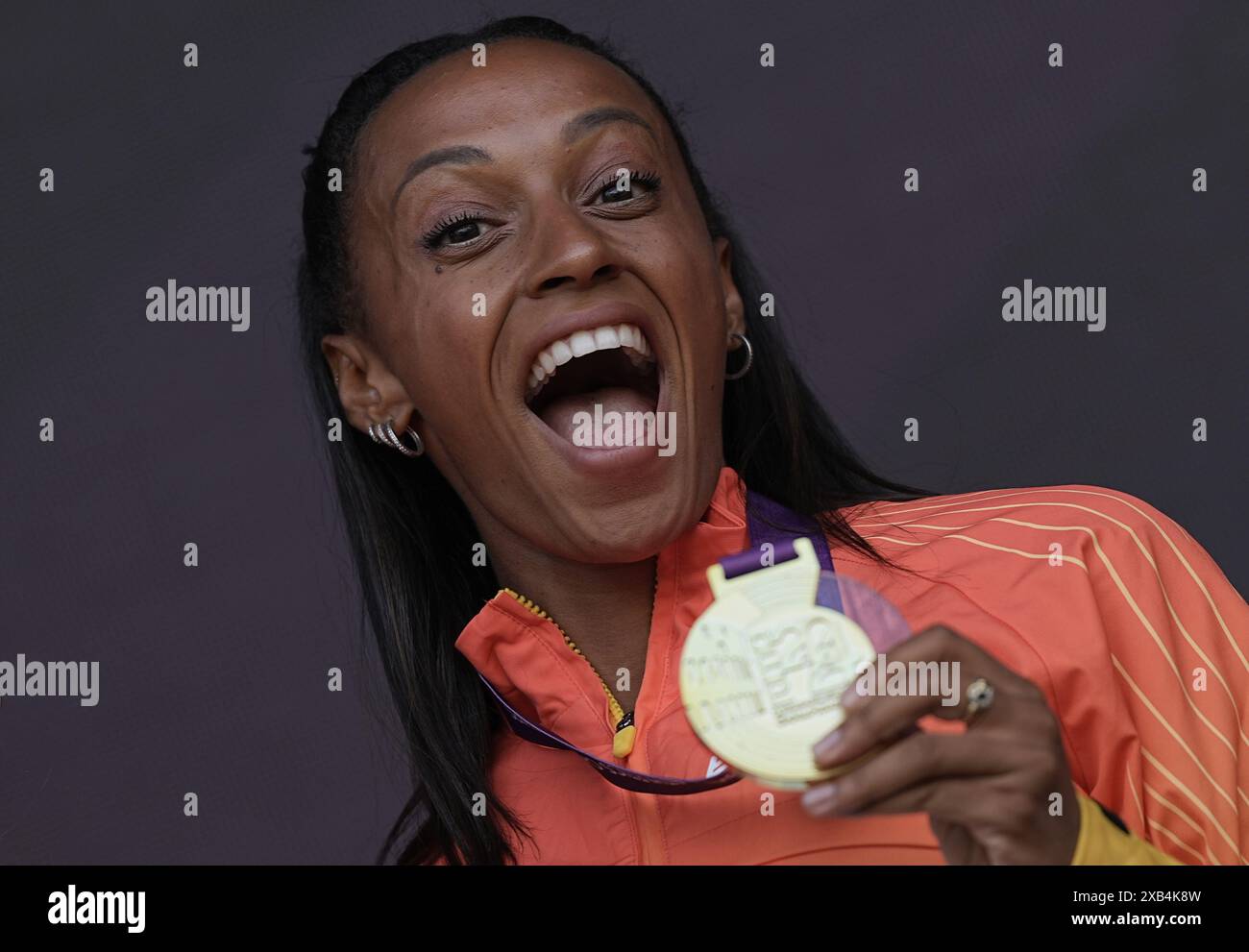 Triple jump gold medal hi-res stock photography and images - Alamy