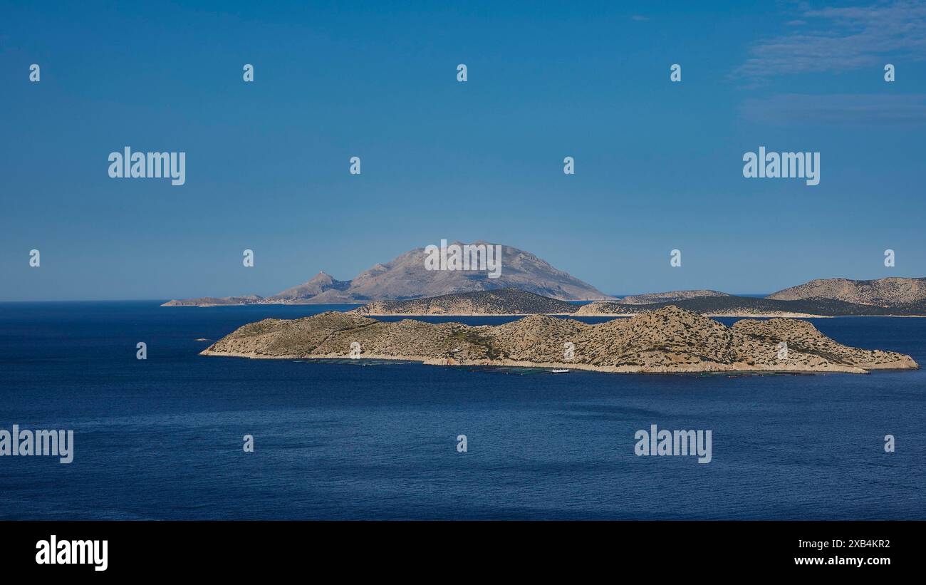 View of an island in the blue sea, surrounded by clear skies and wide ...