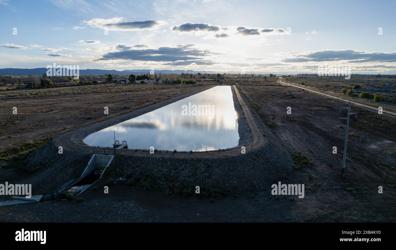 Water reserve for agriculture in dry areas. Aerial photo at sunset ...