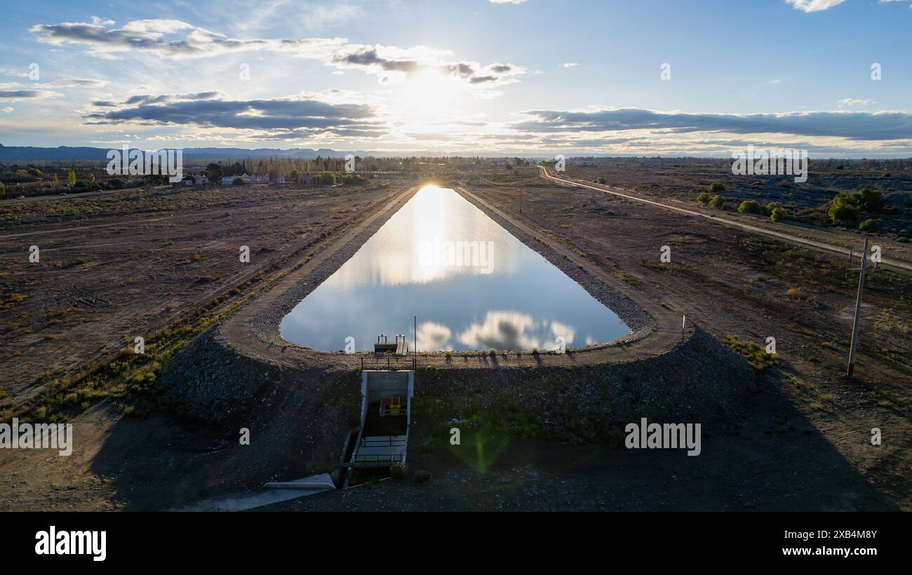 Water reserve for agriculture in dry areas. Aerial photo at sunset ...