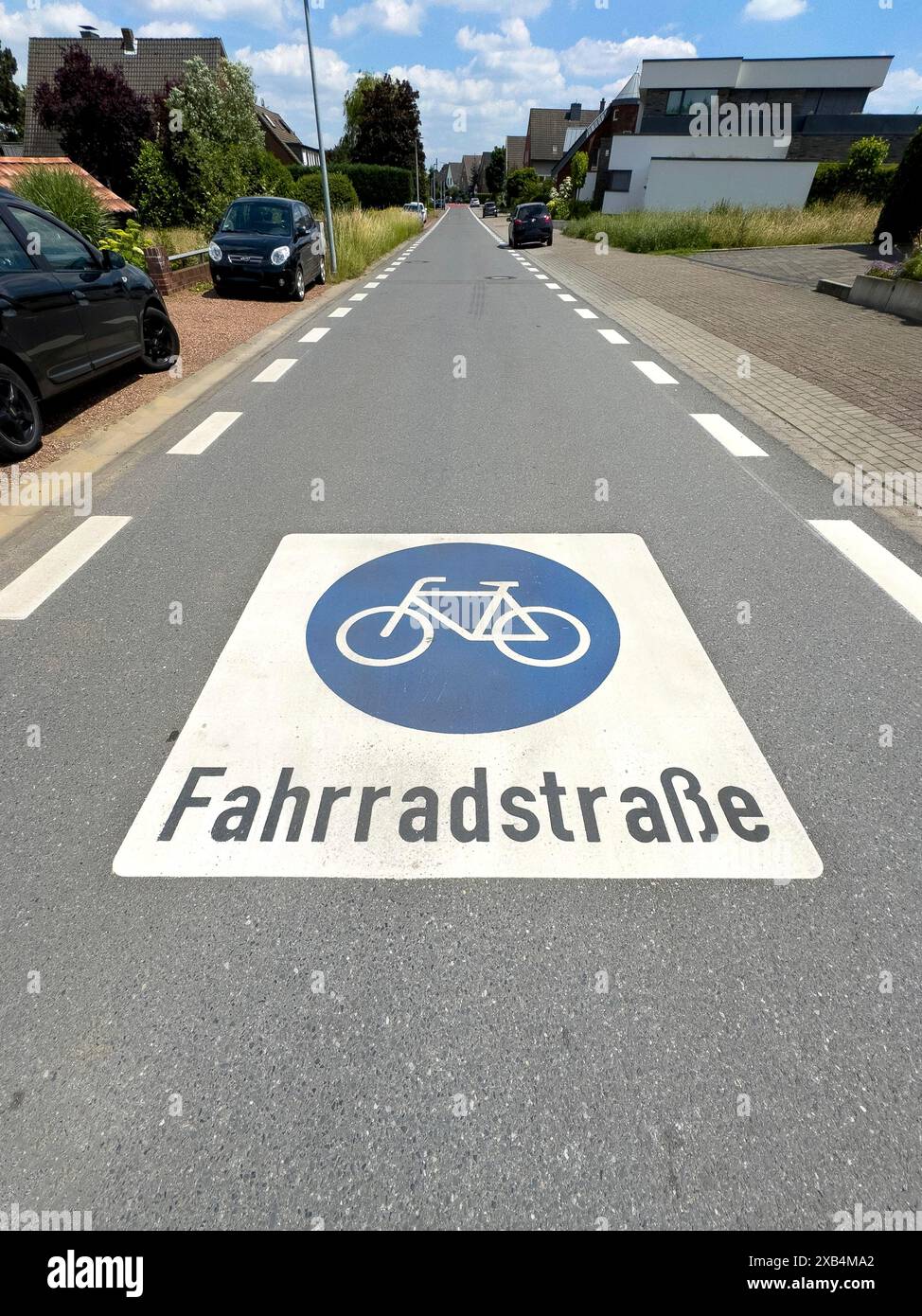 Bicycle road sign painted on the carriageway, Kirchhelllen, North Rhine ...