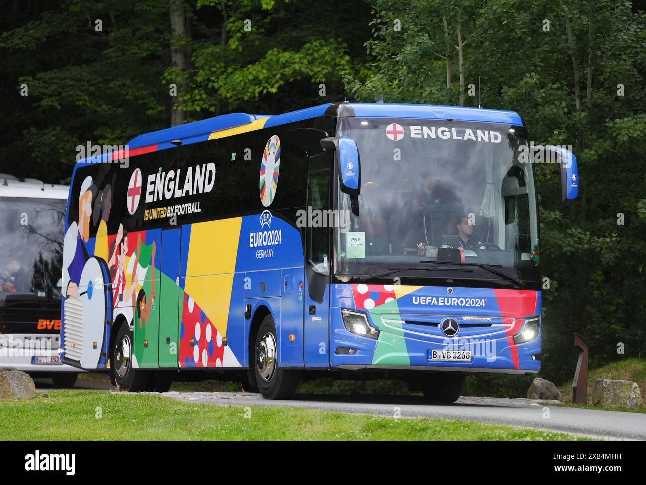 The England team bus arrives at their training base, the Spa & Golf ...