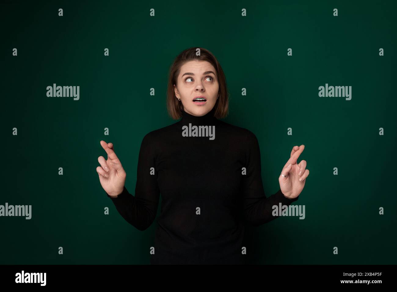 Woman standing still posing hi-res stock photography and images - Alamy