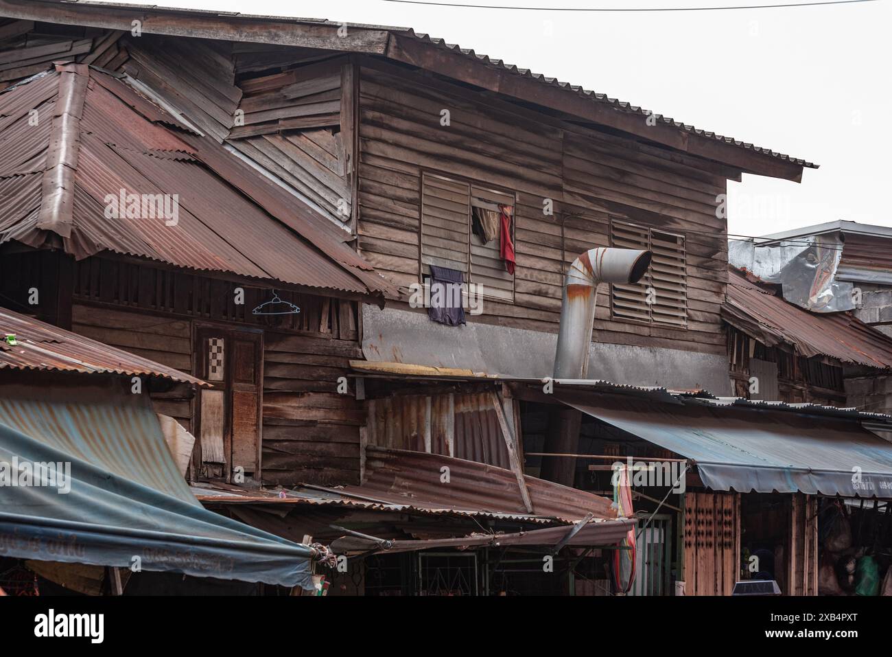 Bangkok, Thailand - March 28, 2024: old plank houses near Khlong Toei ...