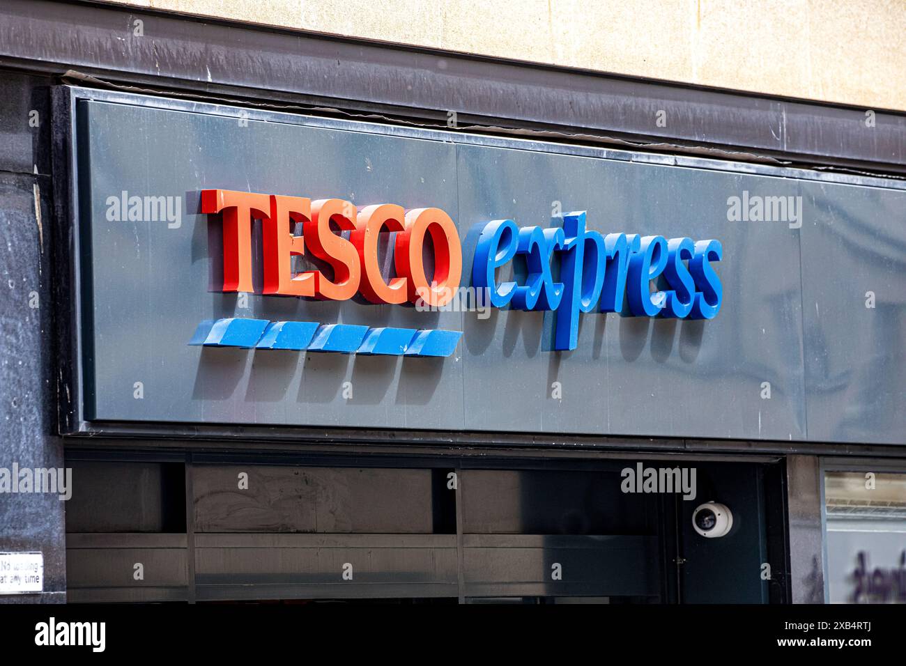 Signage, branding, logo and shopfront of Tesco Express Stock Photo - Alamy