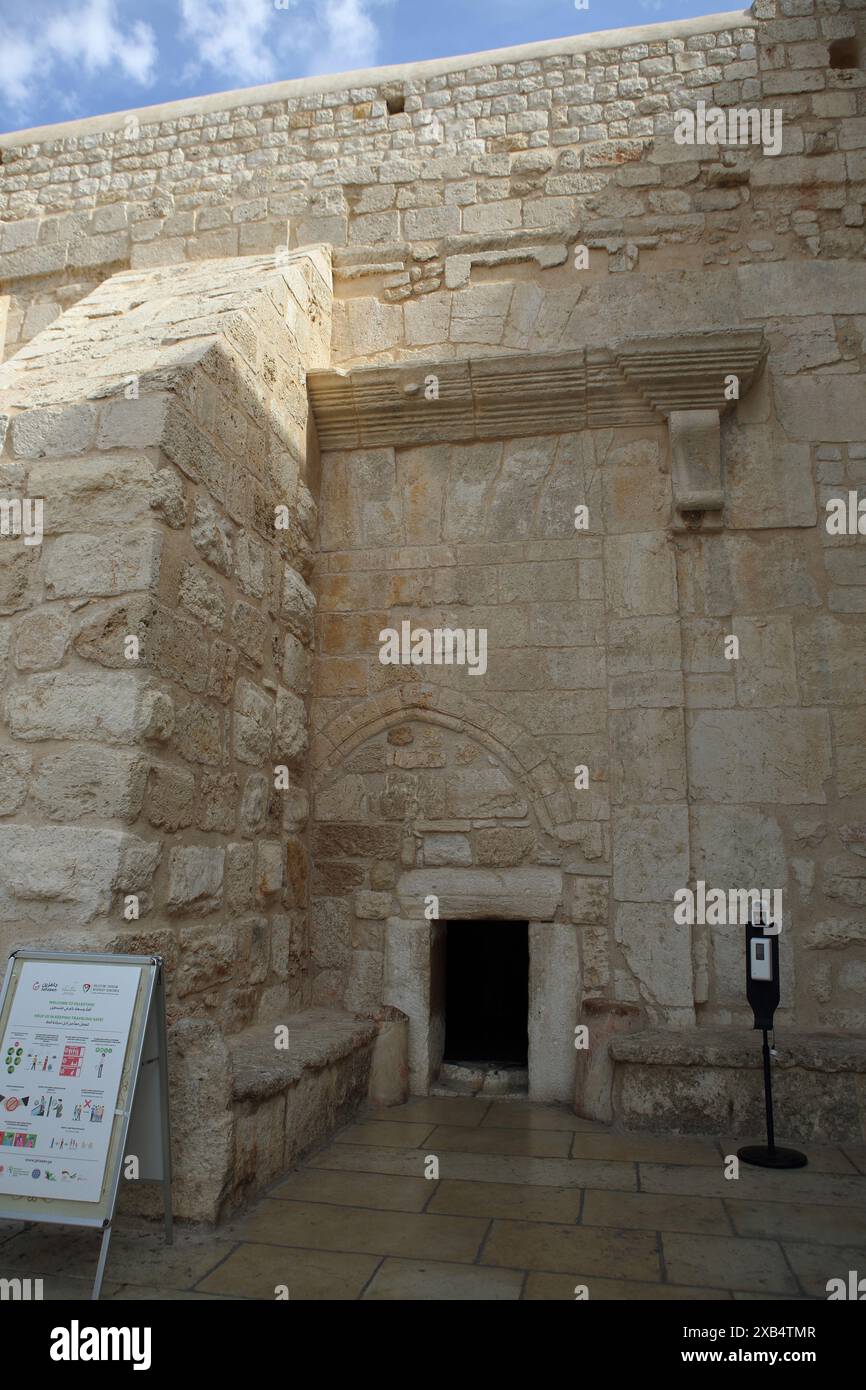 Alcogel for covid 19 near the low Door of Humility to Church of ...