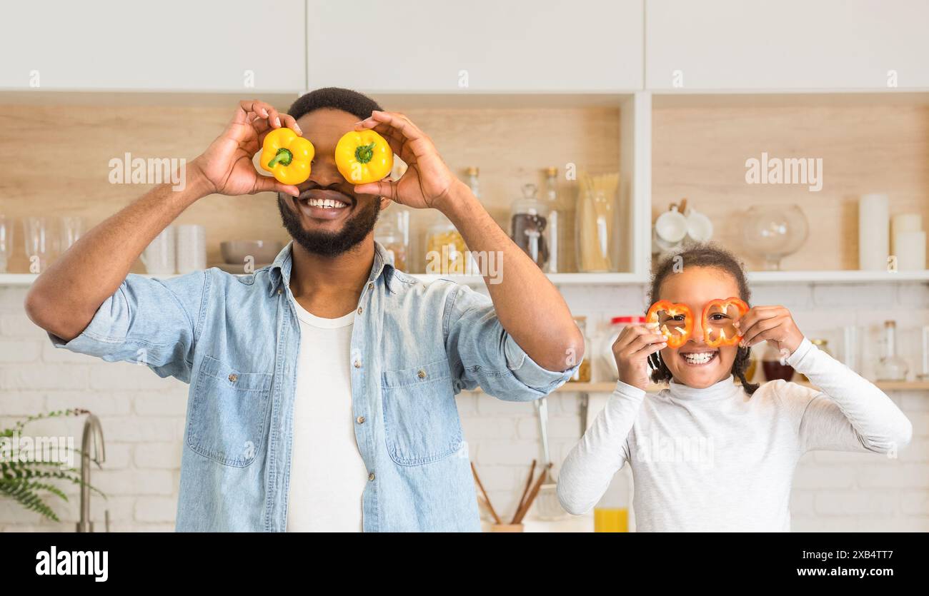 Family fun with food in kitchen at home Stock Photo - Alamy