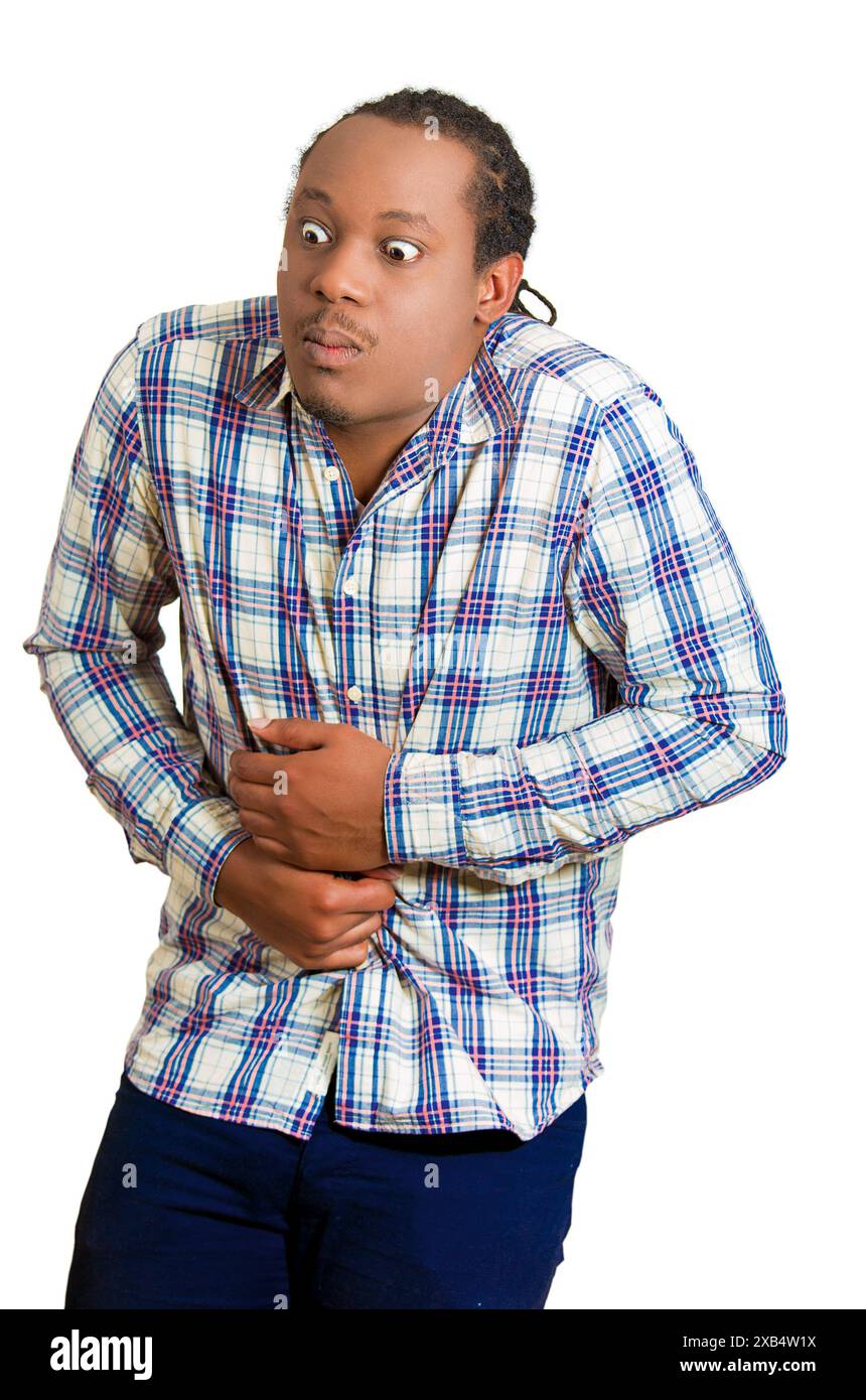 portrait miserable, upset, ill, unhealthy, young man, doubling over in ...