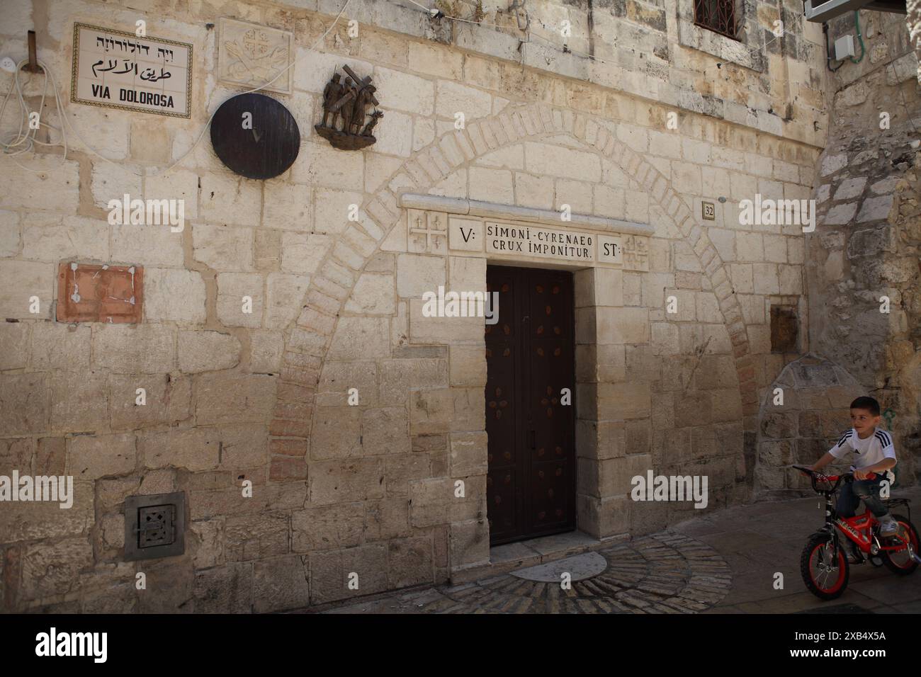 Via Dolorosa, 5th Station of the Cross, where Simon from Cyrene was ...