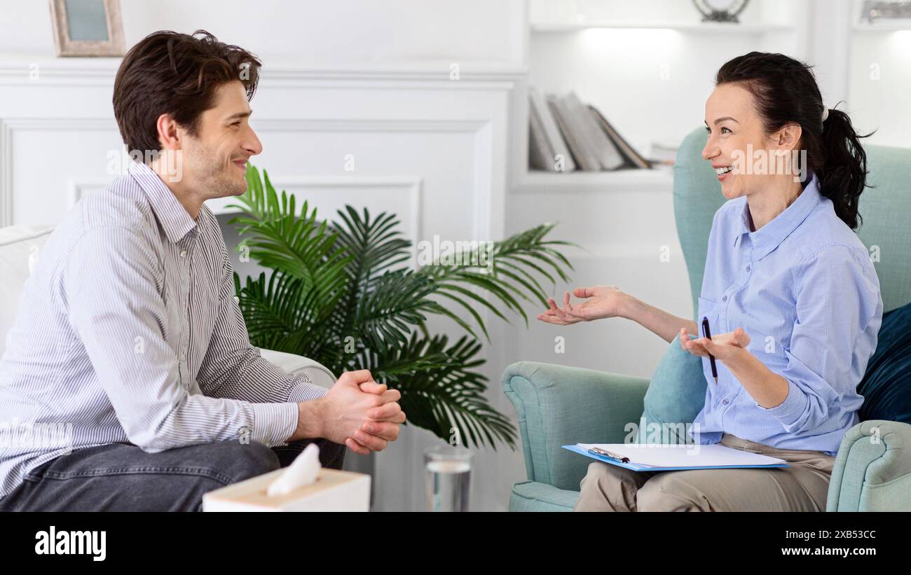 Man and Woman Engaging in Conversation During Daytime Counseling ...