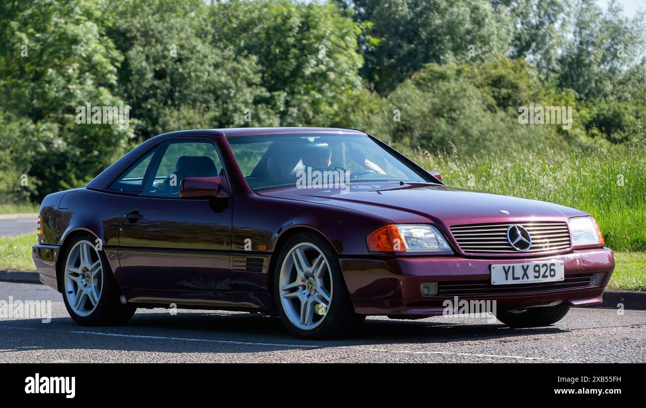 Stony Stratford,UK - June 2nd 2024: 1992 maroon Mercedes Benz sl ...