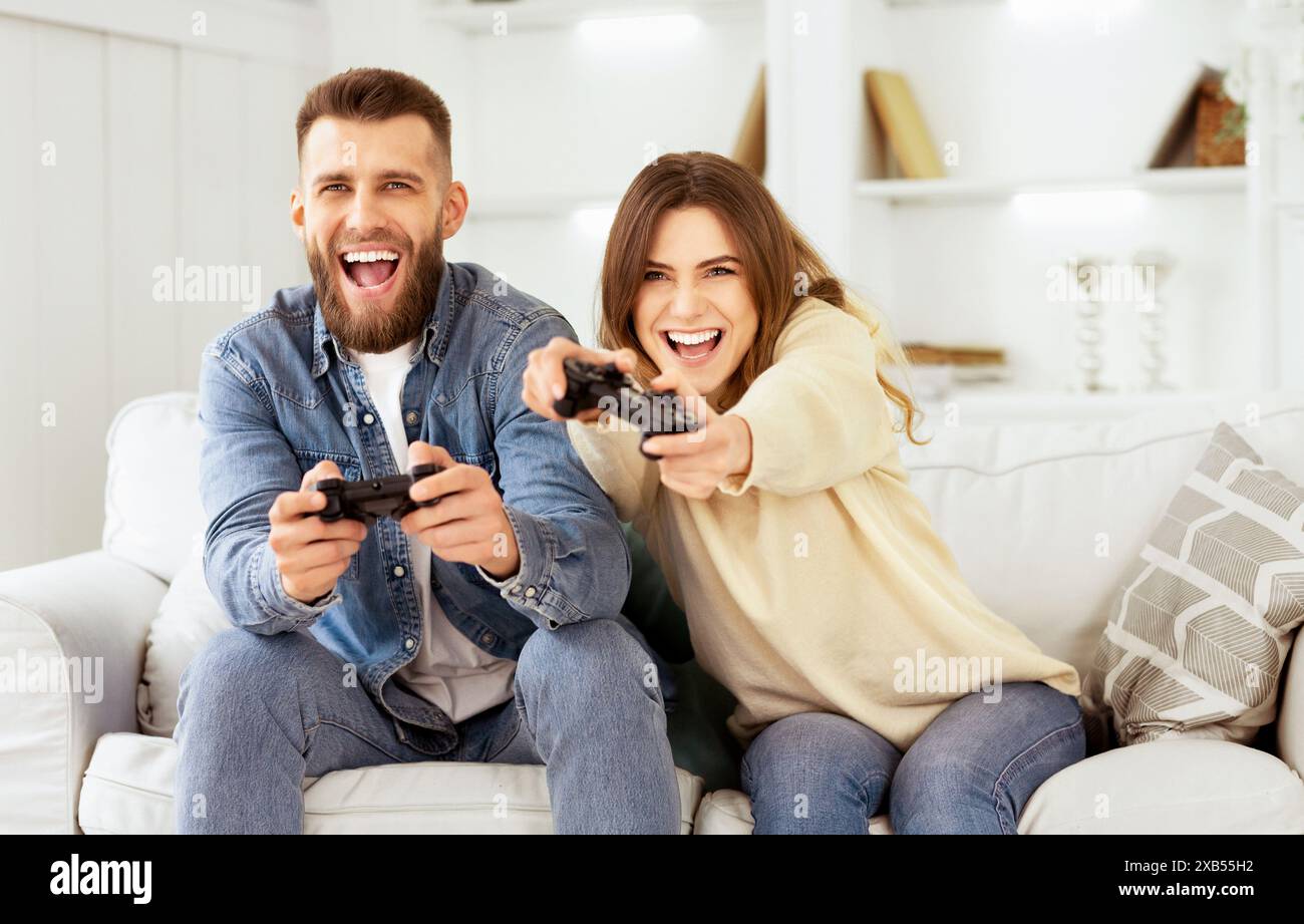 Girl playing on playstation game hi-res stock photography and images ...
