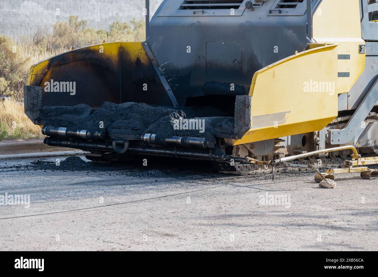 Heavy equipment laying asphalt in a residential neighborhood Stock ...