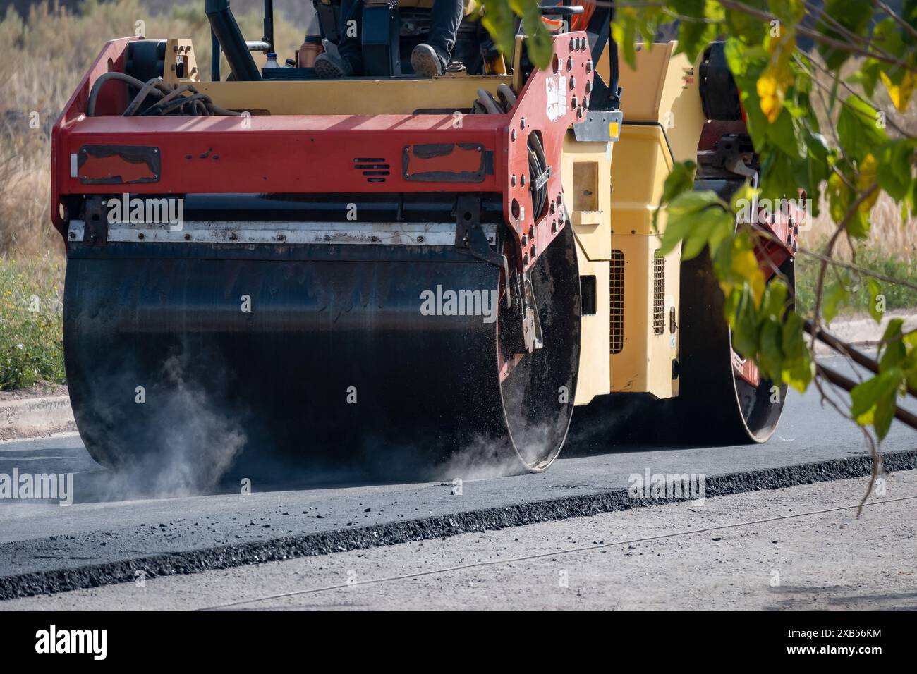 Heavy equipment laying asphalt in a residential neighborhood Stock ...