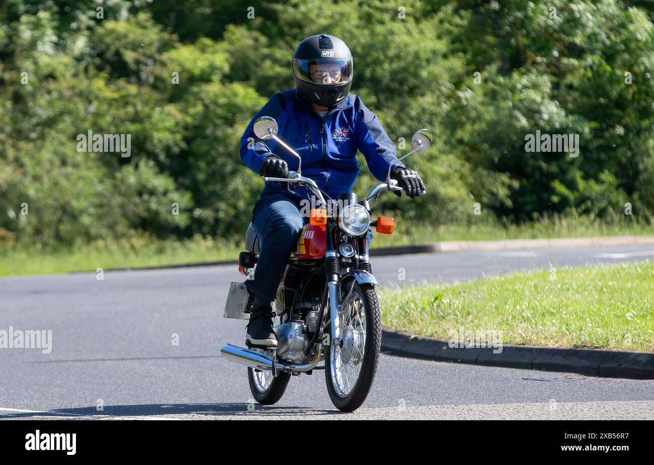 Stony Stratford,UK - June 2nd 2024: 1993 49cc Yamaha moped on a British ...