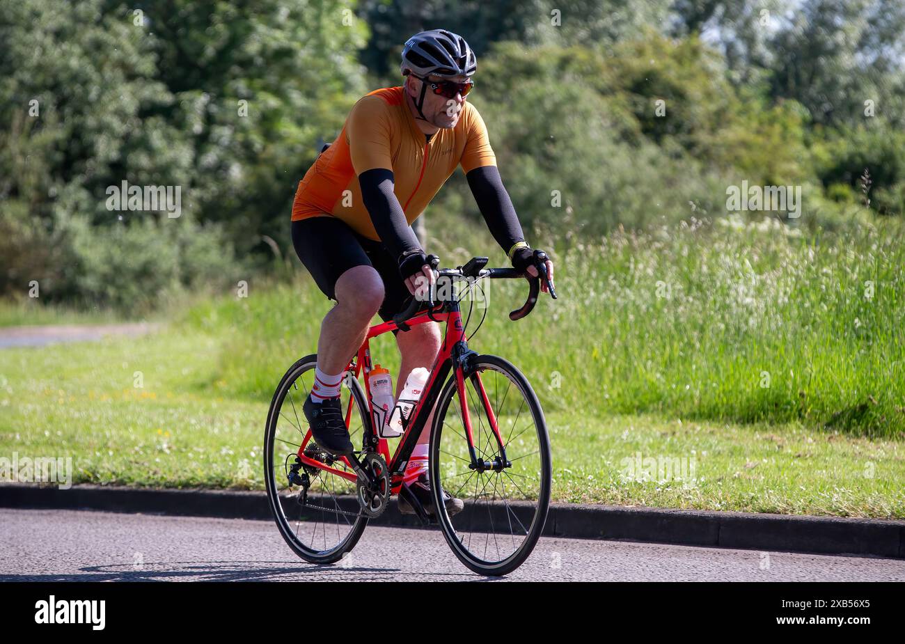 Stony Stratford,UK - June 2nd 2024: Cyclist wearing skin tight lycra ...