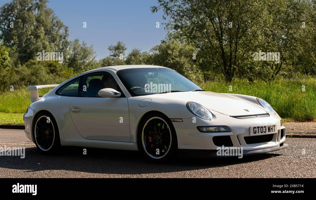 Stony Stratford,UK - June 2nd 2024:2008 white Porsche 911 car driving ...