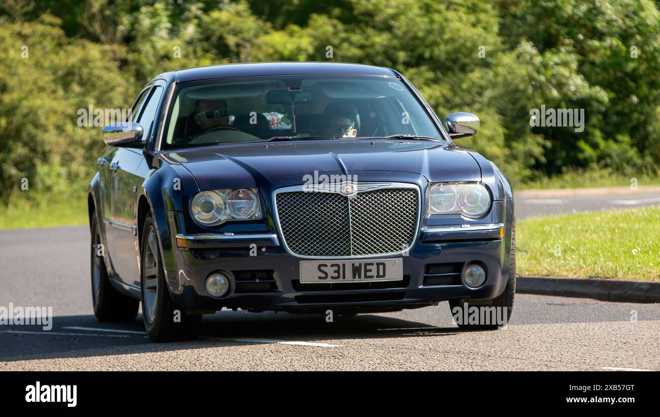 Stony Stratford,UK - June 2nd 2024: 2006 Chrysler-Jeep 300c car driving ...