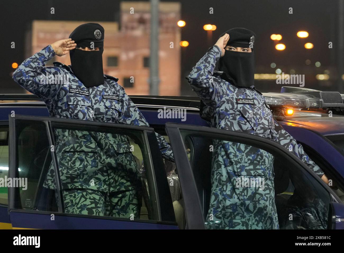 Women of the Saudi forces for Hajj and Umrah perform a military parade ...