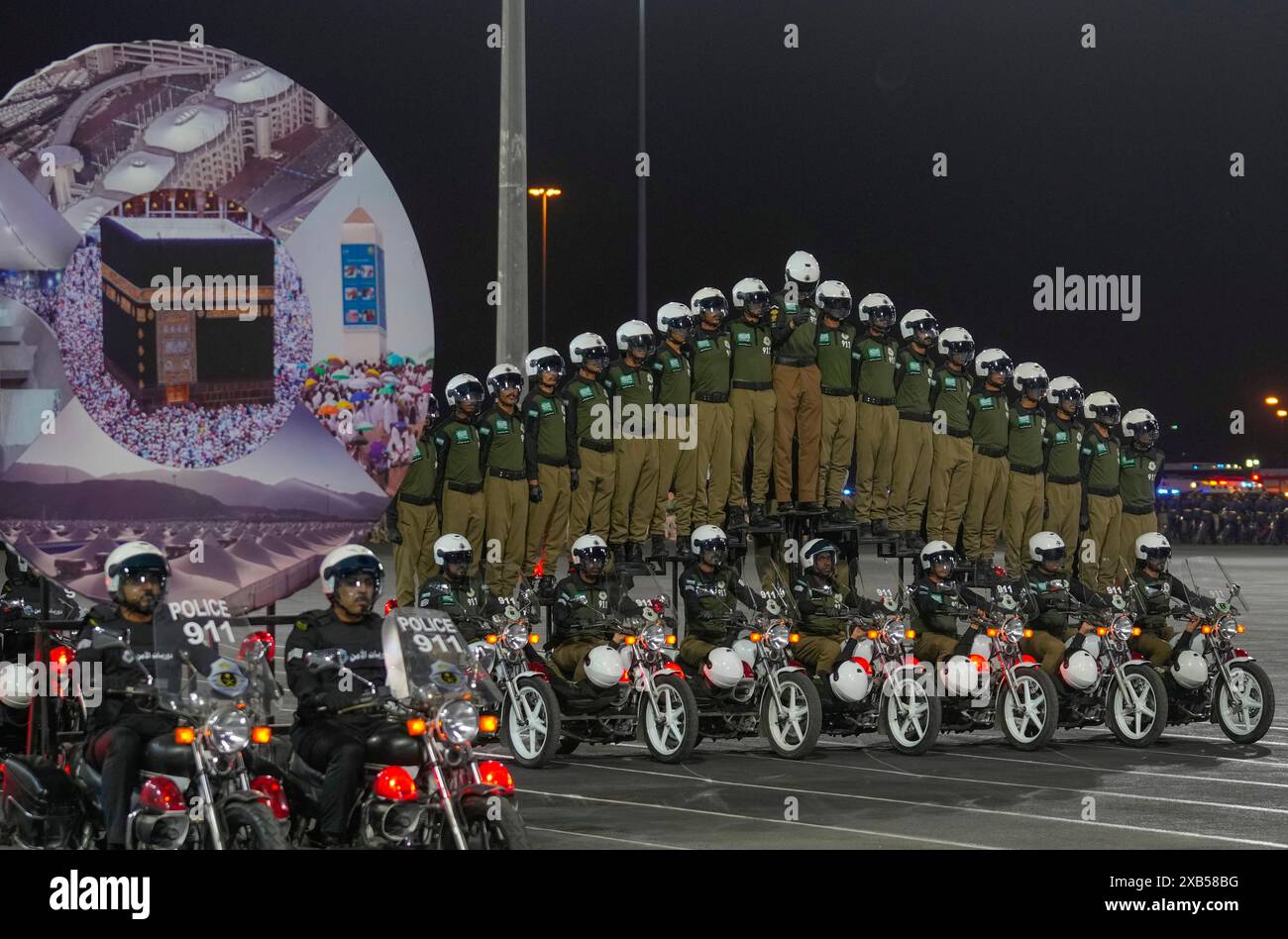 Members of the Saudi forces for Hajj and Umrah perform during a ...