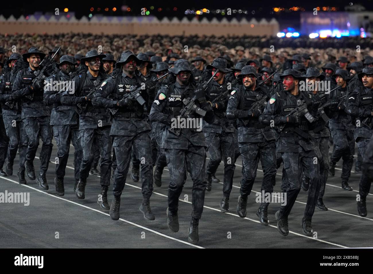 Members of the Saudi forces for Hajj and Umrah perform during a ...