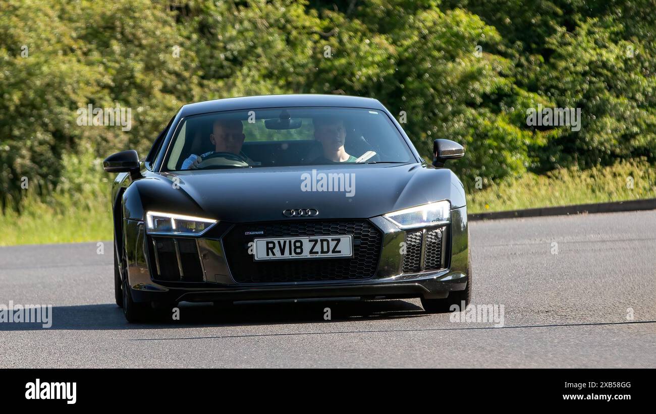 Stony Stratford,UK - June 2nd 2024: 2018 black Audi R8 car driving on a ...