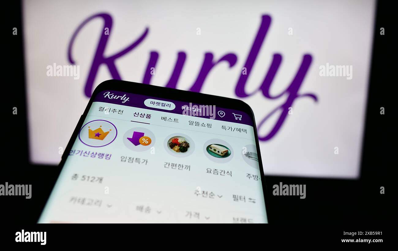 Mobile phone with website of South Korean grocery e-commerce company ...