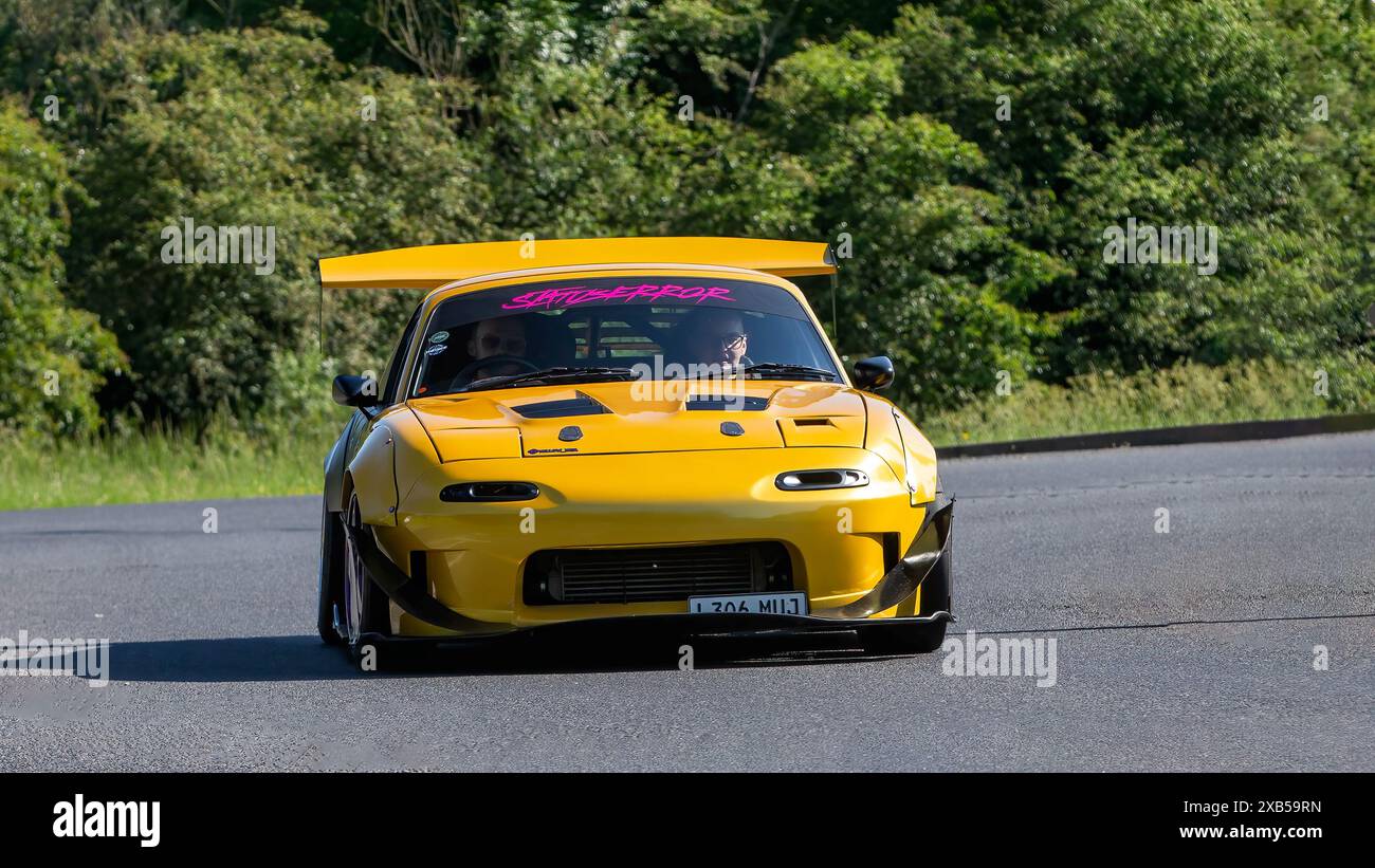Stony Stratford,UK - June 2nd 2024: 1994 yellow Mazda MX-5 classic ...