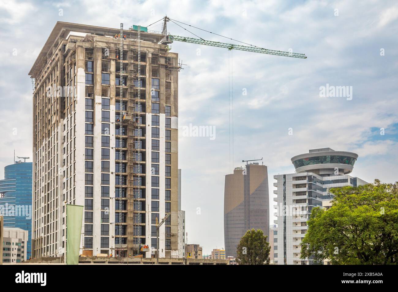 Modern rapidly growing downtown skyscrapers of central business ...