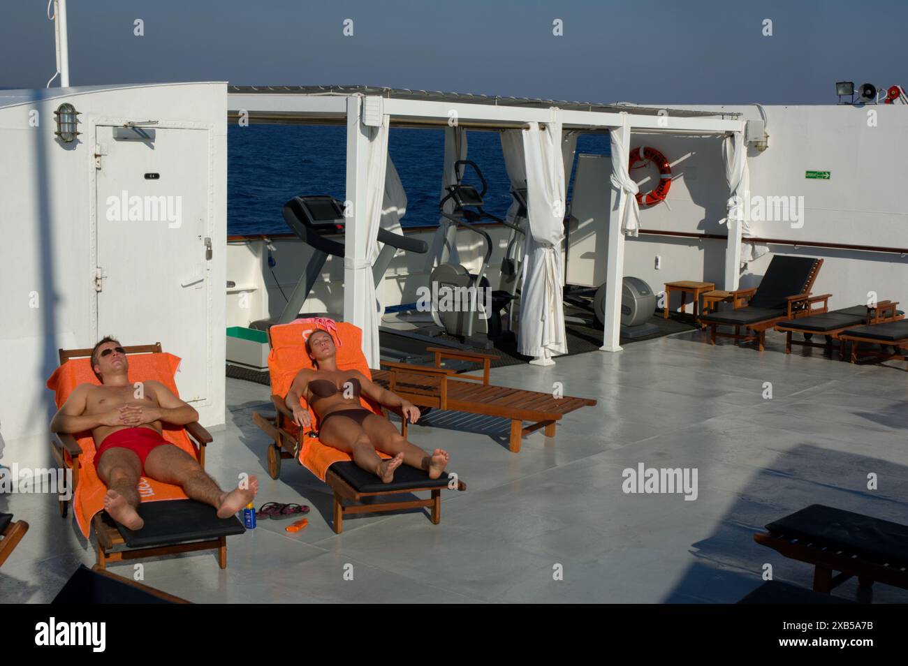 Passengers sunbathing on cruise ship easyCruiseOne in the Aegean Stock ...