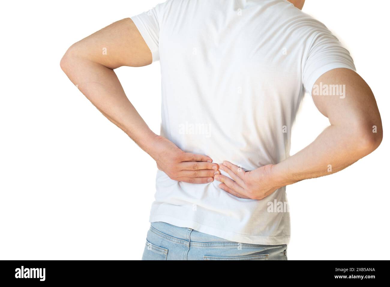 Rear view of a handsome attractive young man holding his back in pain ...