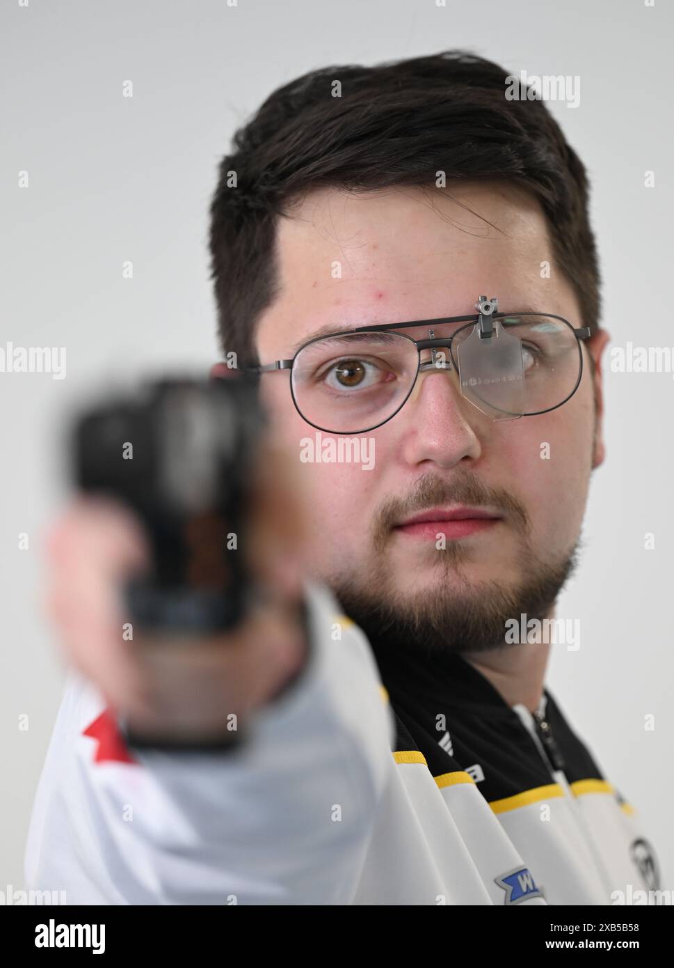 PRODUCTION - 10 June 2024, Hesse, Wiesbaden: Sport shooter Florian ...