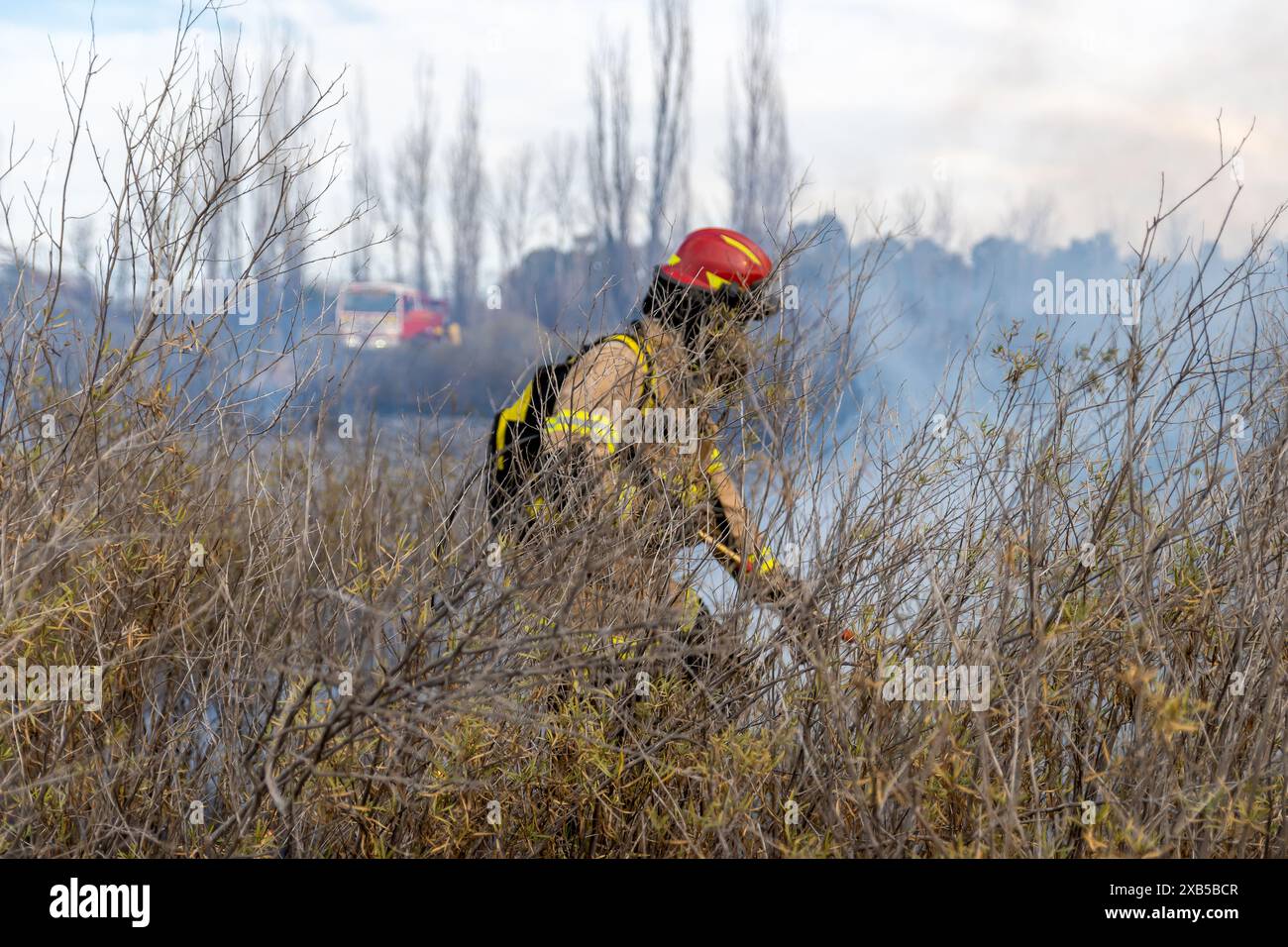 Firefighter in equipment extinguish forest hi-res stock photography and ...
