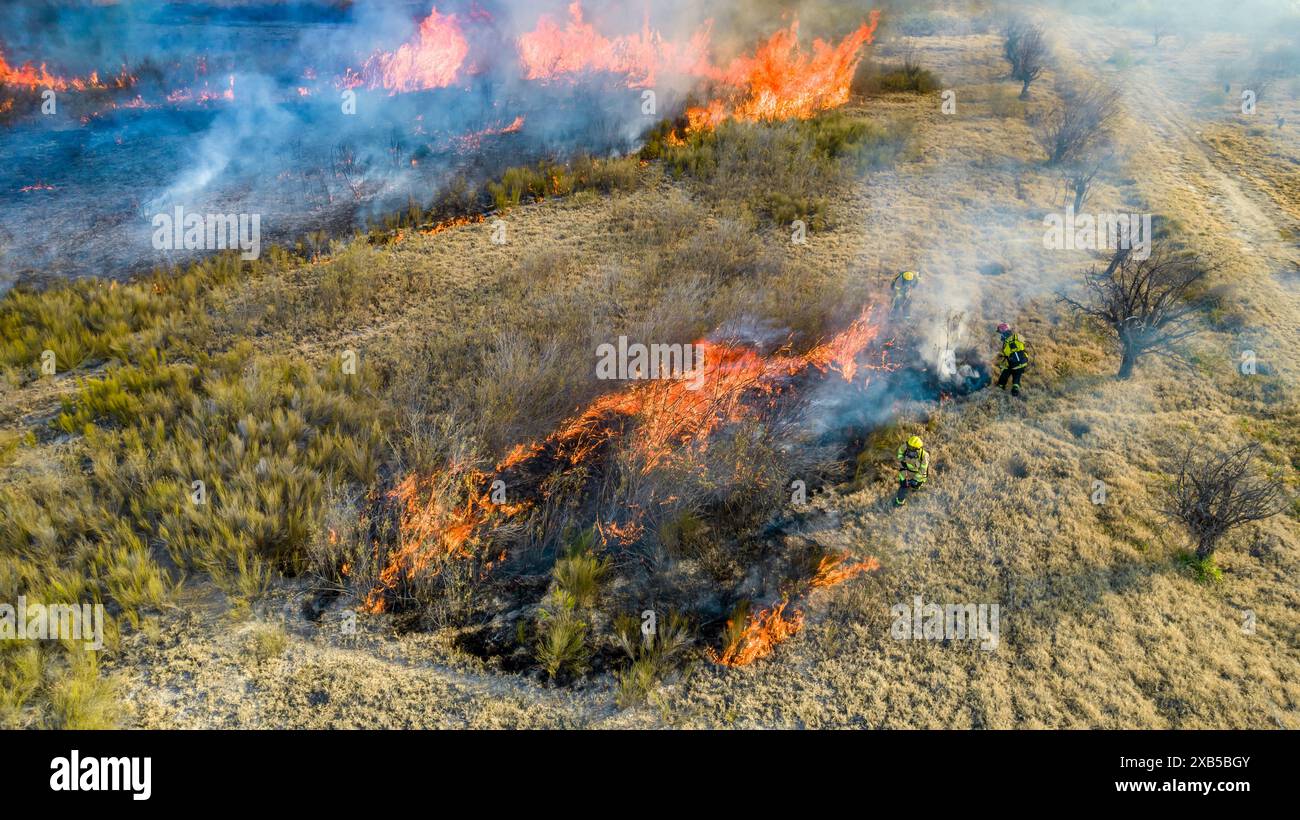 Fire service putting out wildfire hi-res stock photography and images ...