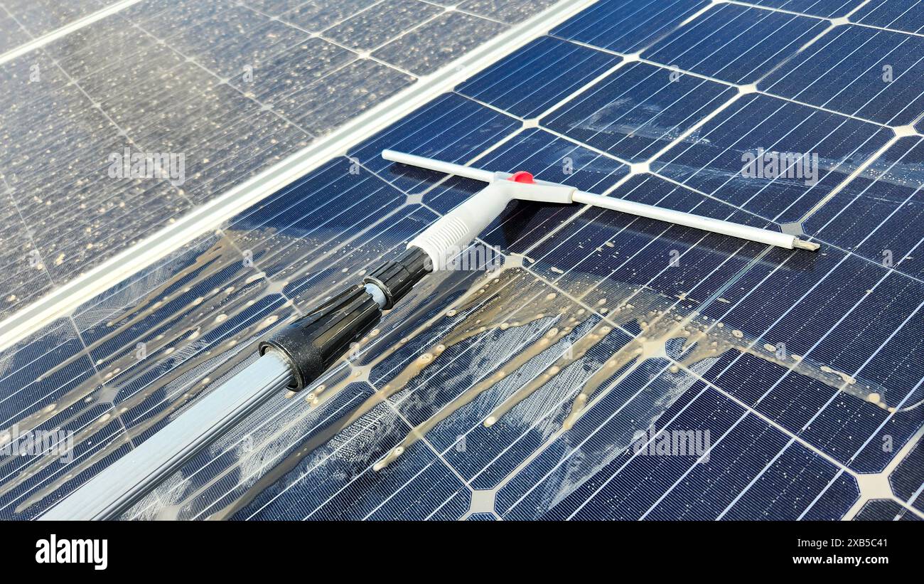 Cleaning dirty solar panel hi-res stock photography and images - Alamy