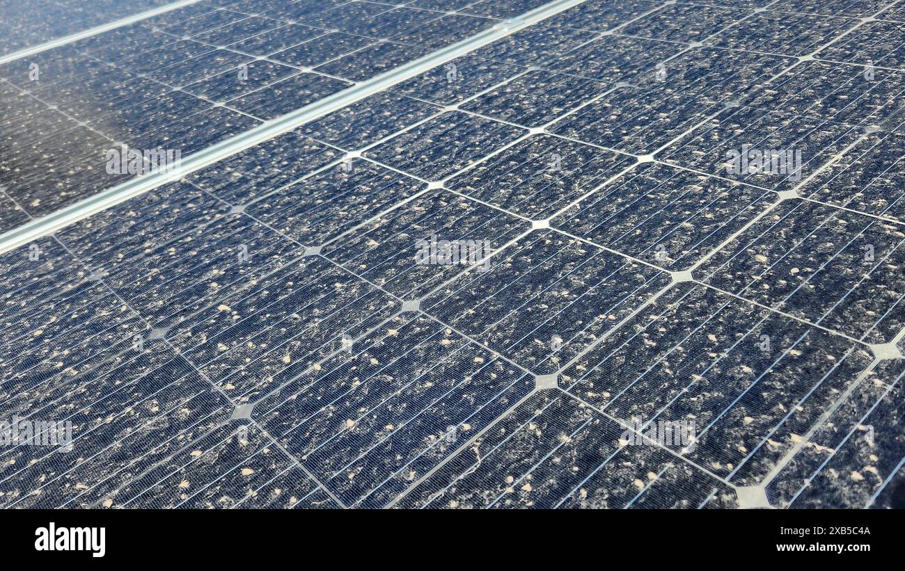 Cleaning dirty solar panels. Maintenance Stock Photo - Alamy