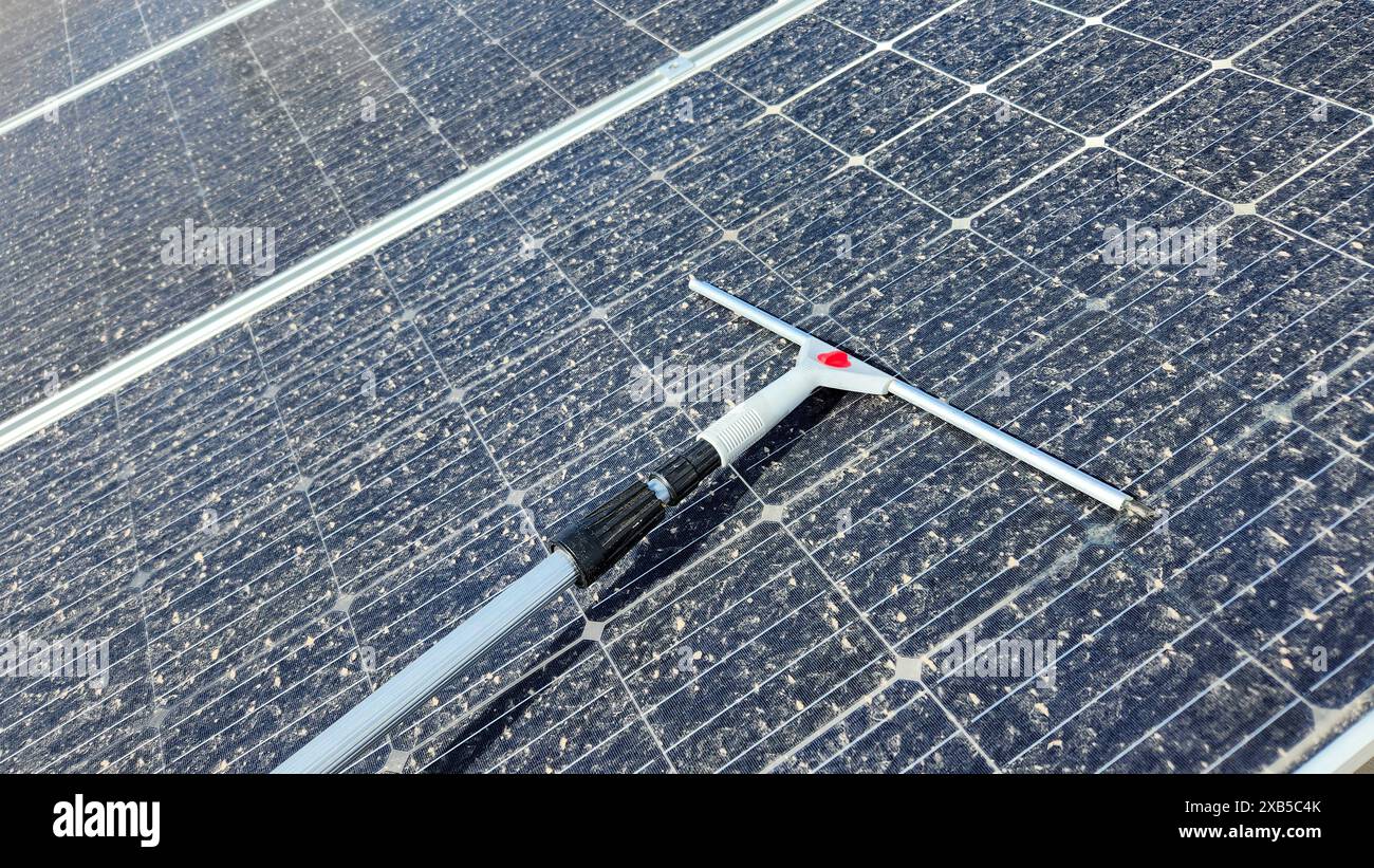 Cleaning dirty solar panel hi-res stock photography and images - Alamy