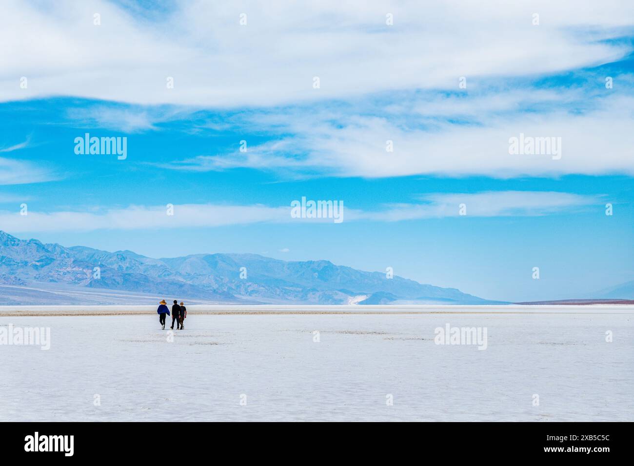 Visitors explore the salt flats at Badwater Basin; minus 282' below sea ...