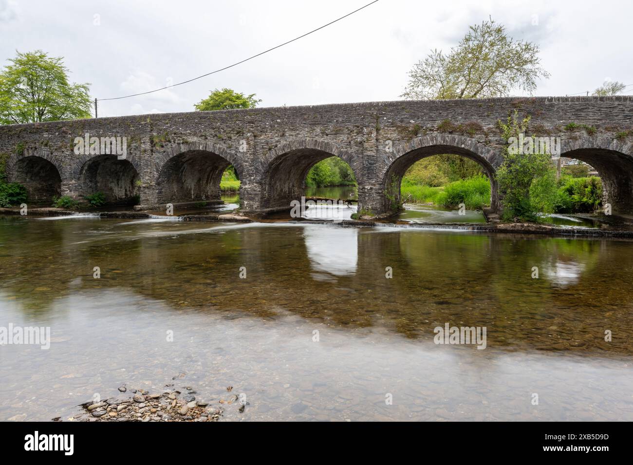 Photo of the river Barle flowing under the bridge in Withypool in ...