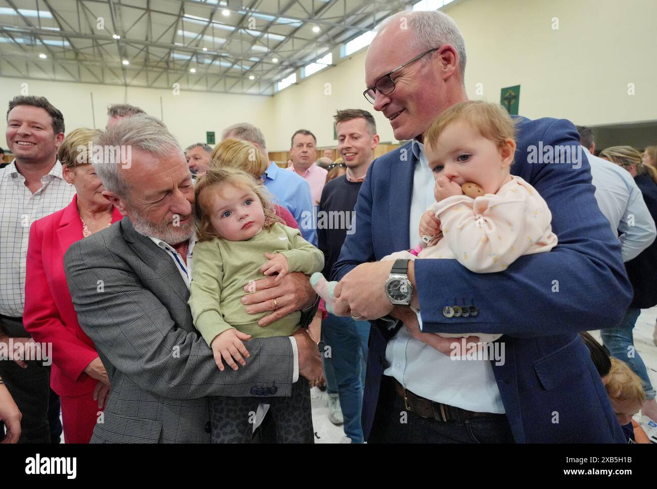 MEP Sean Kelly (left) holding his two-year-old grand daughter Eloise ...