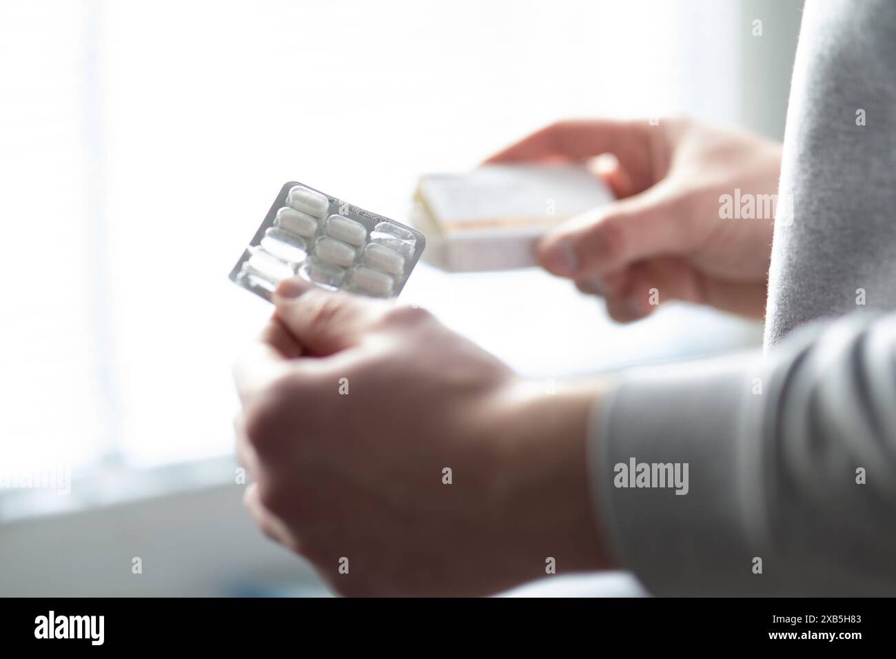 Pharmacist holding mockup medicine in hi-res stock photography and ...