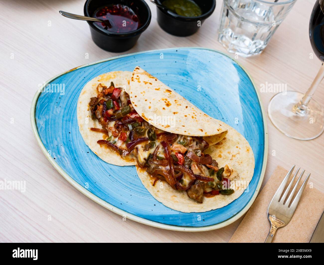 Plate served delicious tacos cheese hi-res stock photography and images ...