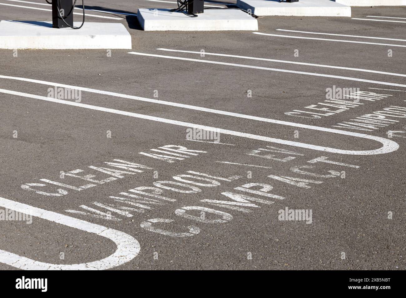 Empty parking spaces for electric cars, free spaces for clean air ...