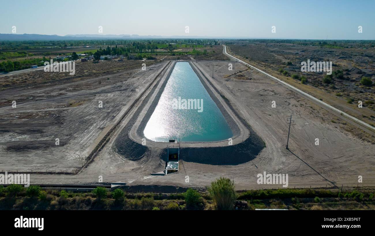 Aerial view of artificial water reservoir for agricultural irrigation ...